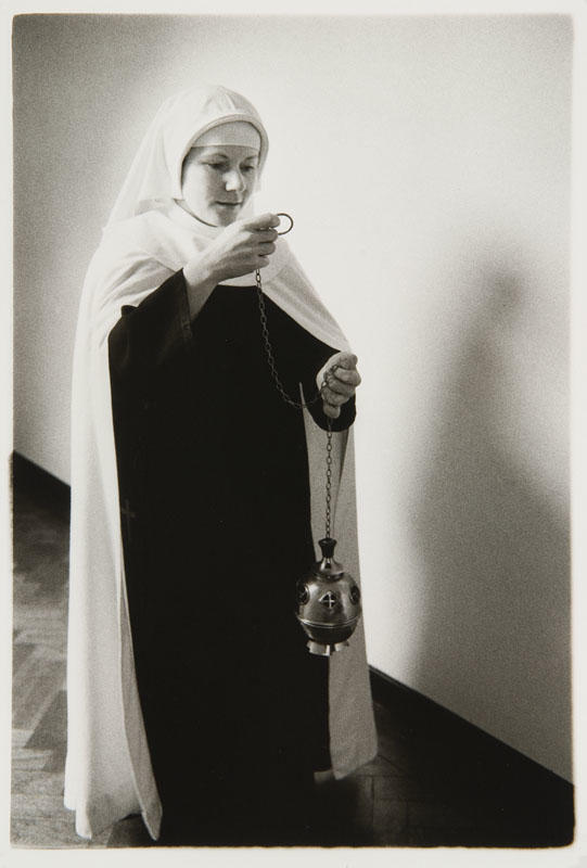 Sister Therese taking the thurifer to the sanctuary. As sacristing she ...